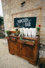 15 Cute Wedding Popcorn Bar Ideas + How To Set Them Up